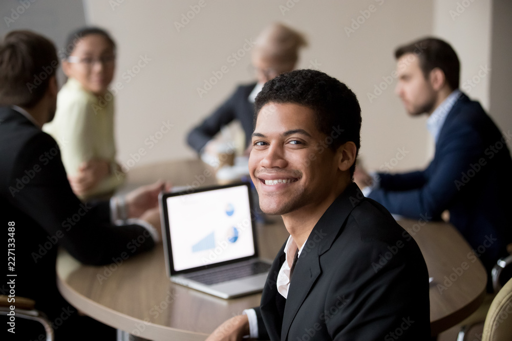 Portrait of smiling African American male employee posing for picture ...