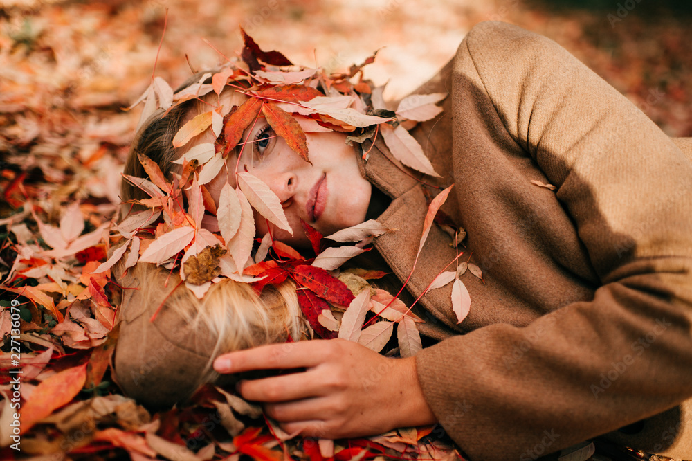 Autumn depression. Beautiful young girl in wool brown fashionable coat ...