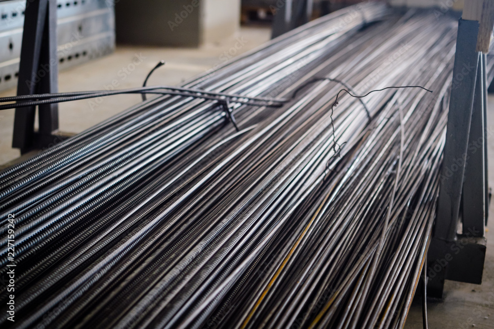 closeup of hard rods division rebars, used on stacked construction ...