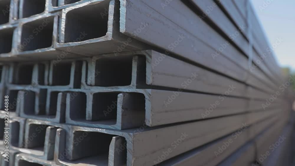 The metal channel laid in rows in the open metal warehouse, the large ...
