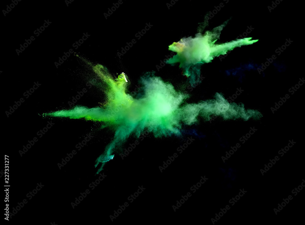 Abstract forms of powder paint and flour combined together explode in ...