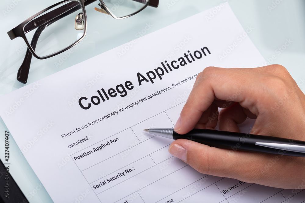 Person Filling College Application Form Stock Photo | Adobe Stock