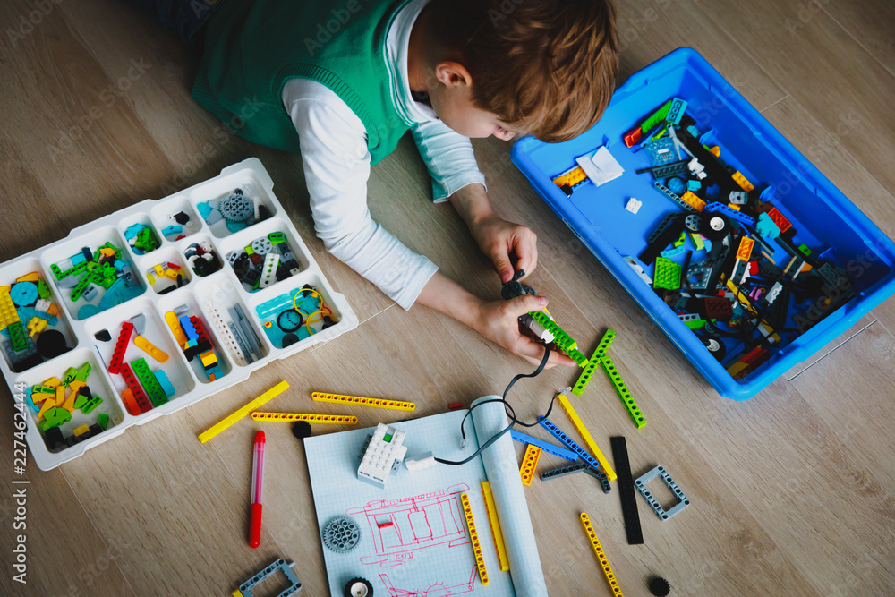 child building robot at robotic technology school lesson Stock Photo ...