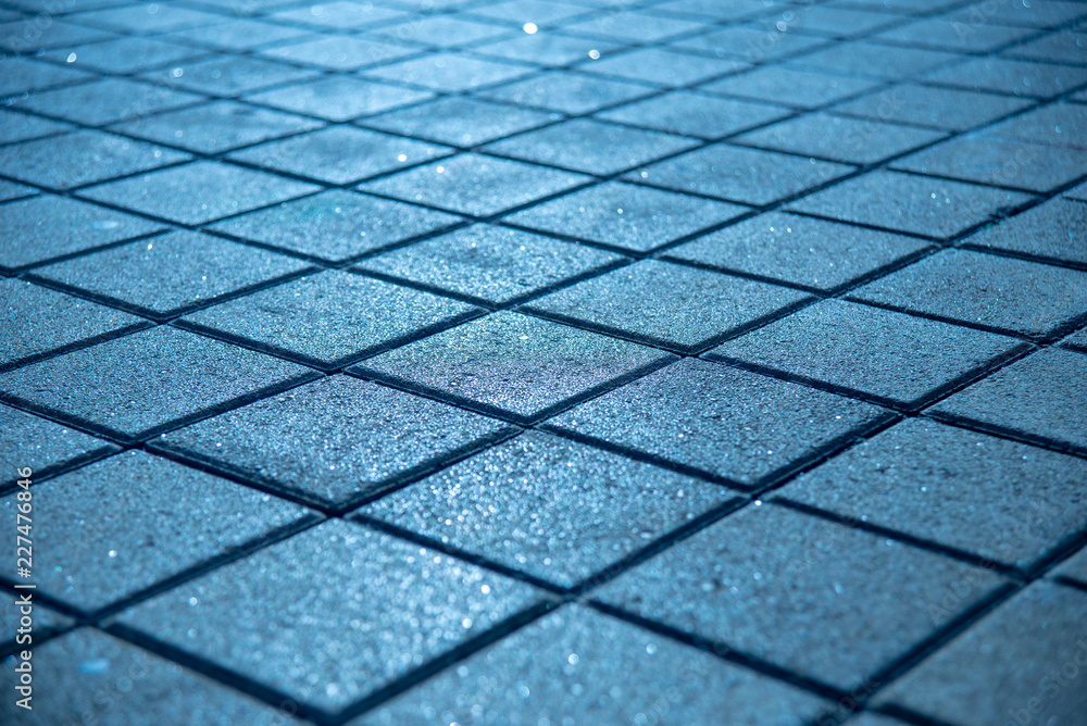 Moonlight on pressed sandstone paving slabs An unusual perspective of a ...