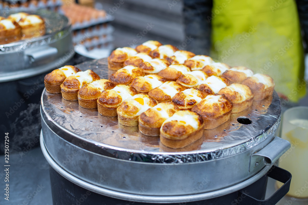 "Egg bun" Bun with fried egg shop on street food at Myeong-dong, Korea ...