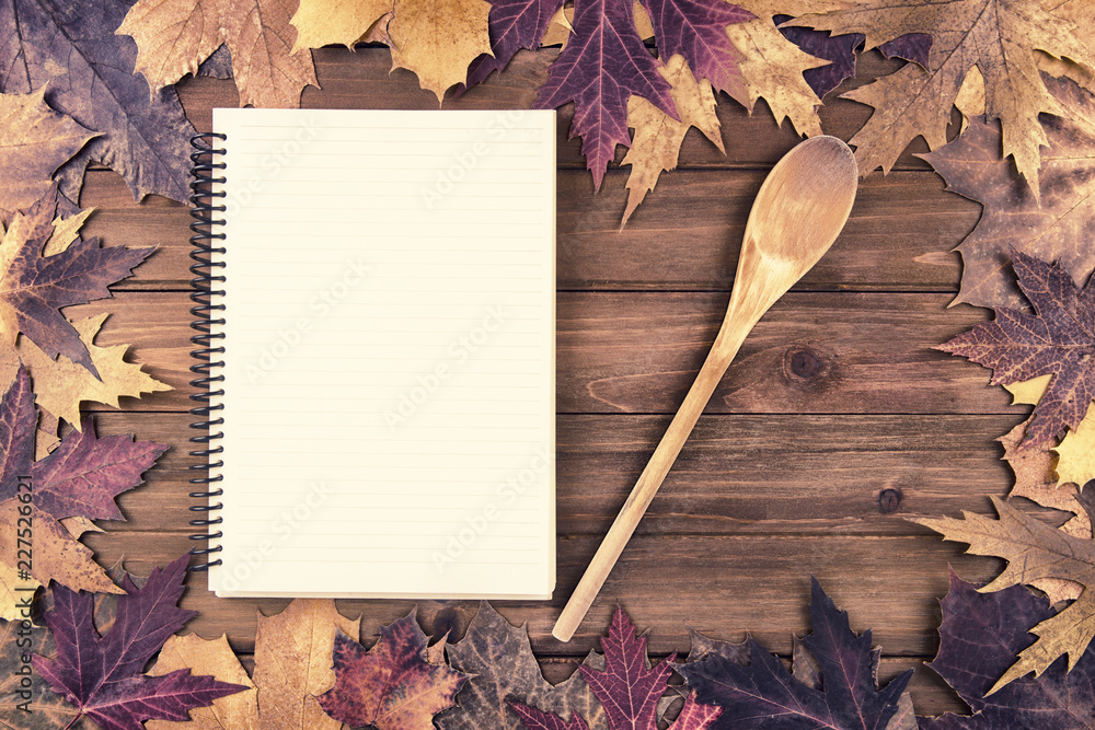 Cooking background with autumn fall leaves on wooden table. View from ...