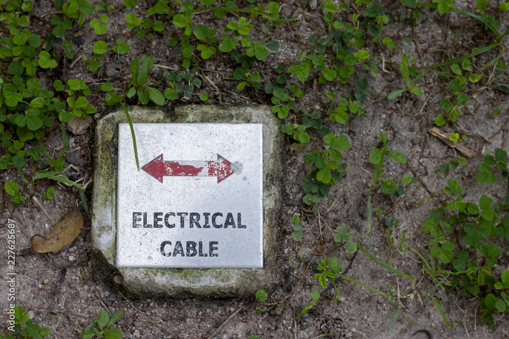 Electrical mark line of cable on the ground leaf or right. Stock Photo ...