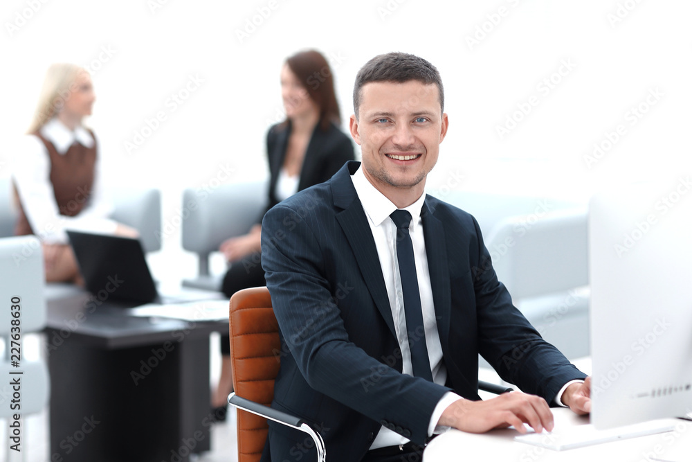 portrait of a successful businessman sitting behind a Desk Stock Photo ...