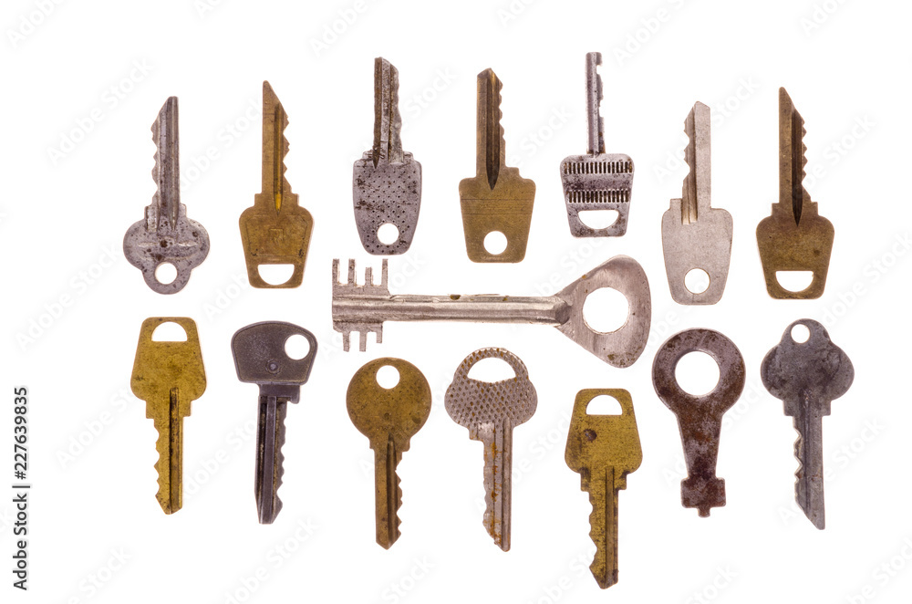 Old vintage keys isolated on white background. Several types of old ...
