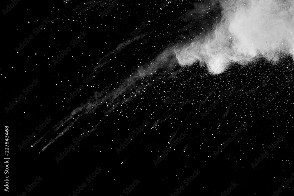 Explosion of white dust on black background. Stock Photo | Adobe Stock