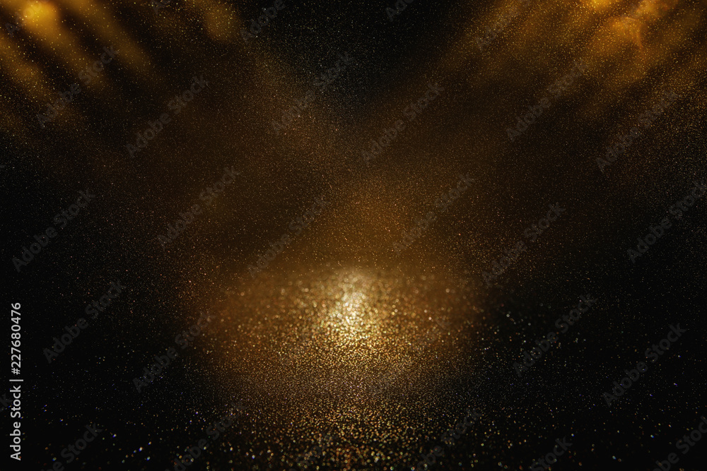 glitter vintage lights background. black and gold. de-focused. Stock ...