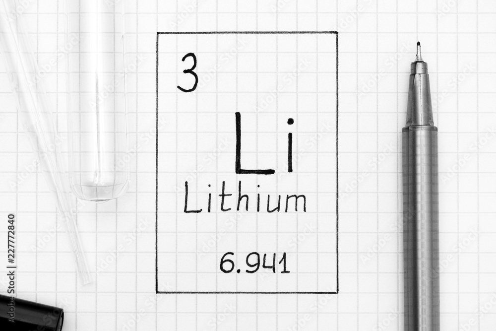 Handwriting chemical element Lithium Li with black pen, test tube and ...