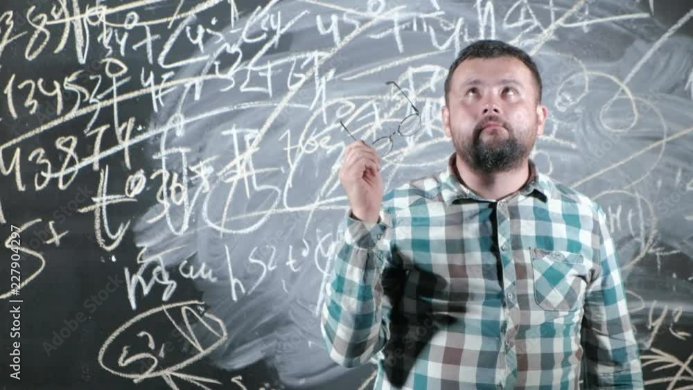 A brilliant mature mathematician brings a big board and completes an ...