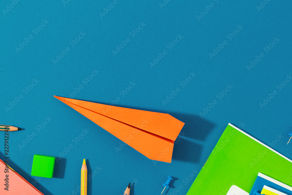 Top view school background Flat lay back to school paper airplane ...