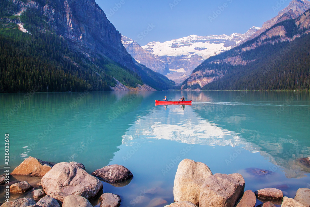Red Canoe on Lake Louise Stock Photo | Adobe Stock
