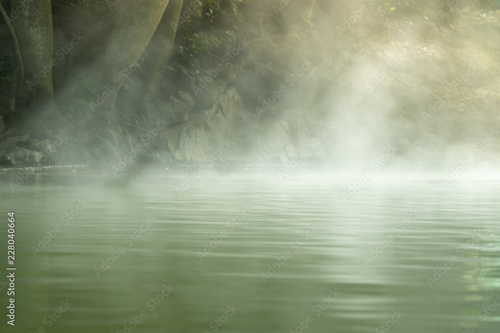 Morning is beautiful fog steam hot spring with sunlight at Hin Dat Hot ...