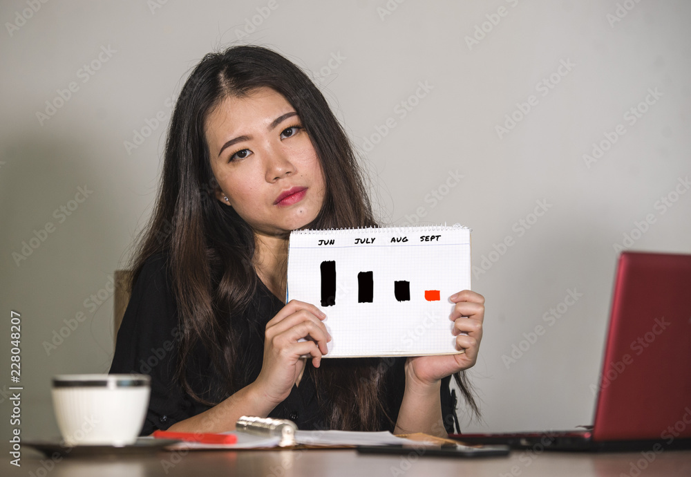 frustrated Asian Korean business woman suffering depression holding ...