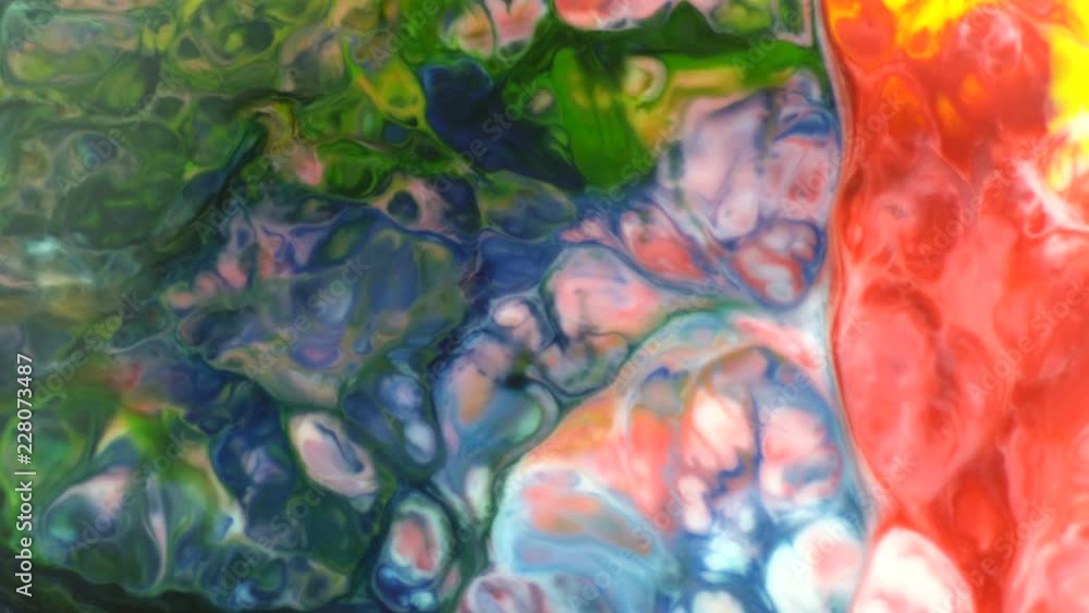 Red Blue Green Yellow Stream abstract food color ink moving or flowing ...