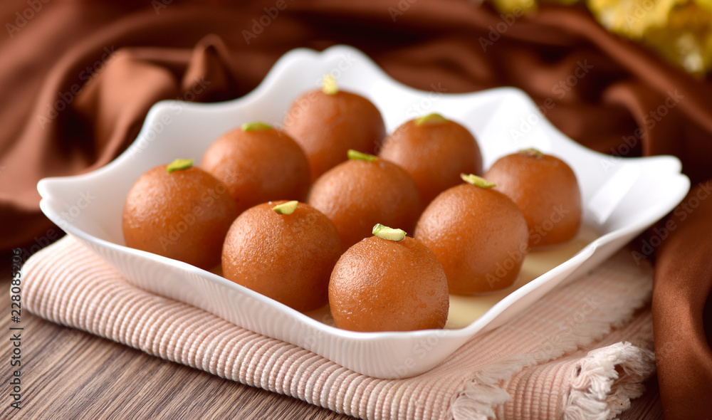 Gulab Jaman, delicious milk solid or khoya balls fried and dipped in ...