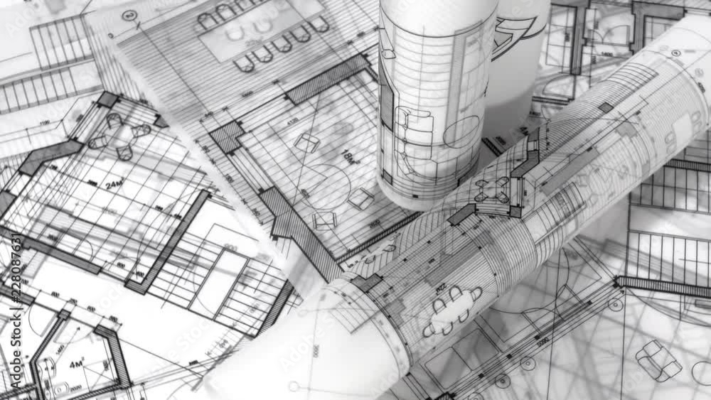Blueprints - rolls of architectural drawings smoothly rotate on the ...