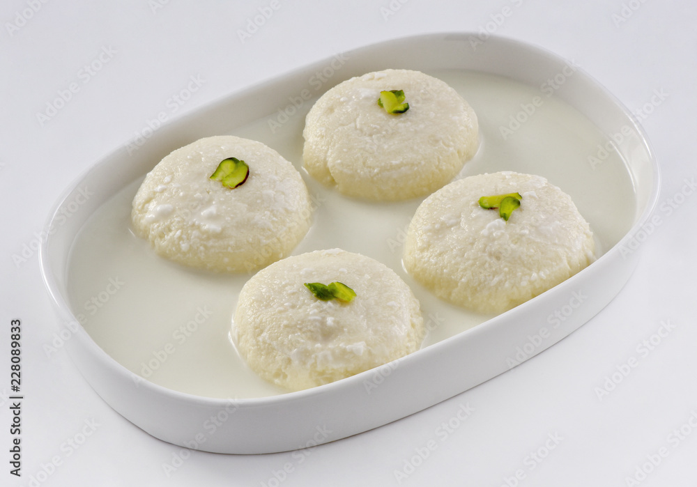 Rasmalai, delicious cottage cheese patty in sweet and thick milk syrup ...