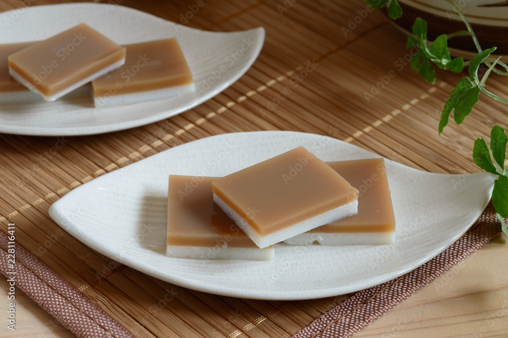 a plate of kanten jelly. Kanten or agar-agar is a jelly-like substance ...
