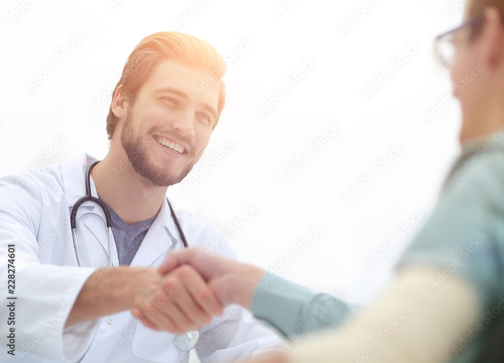 Doctor welcoming a patient in his studio Stock Photo | Adobe Stock