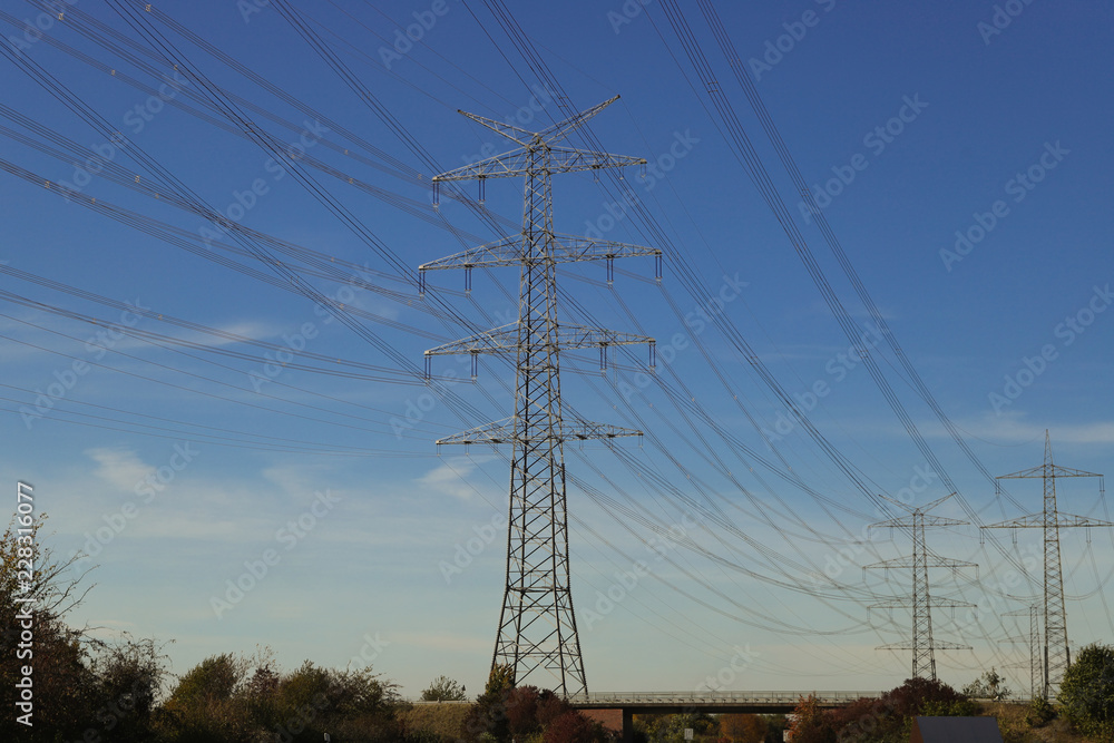 Pylons of a high-voltage power lines Stock Photo | Adobe Stock