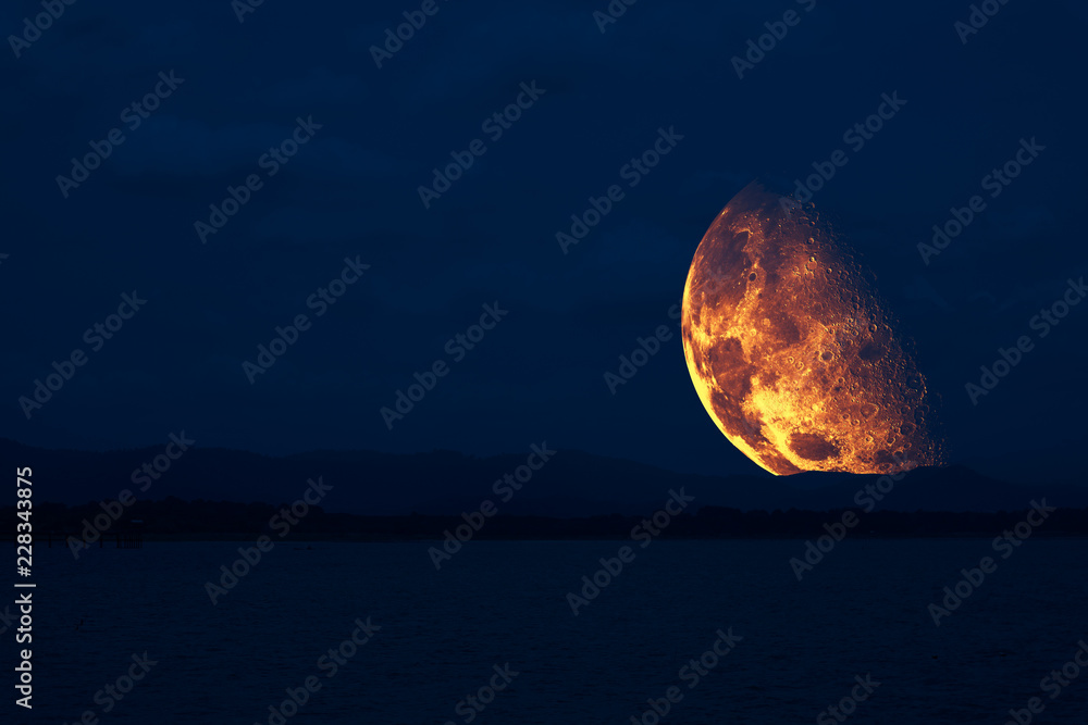 half moon floating in sky back on silhouette mountain Stock Photo ...