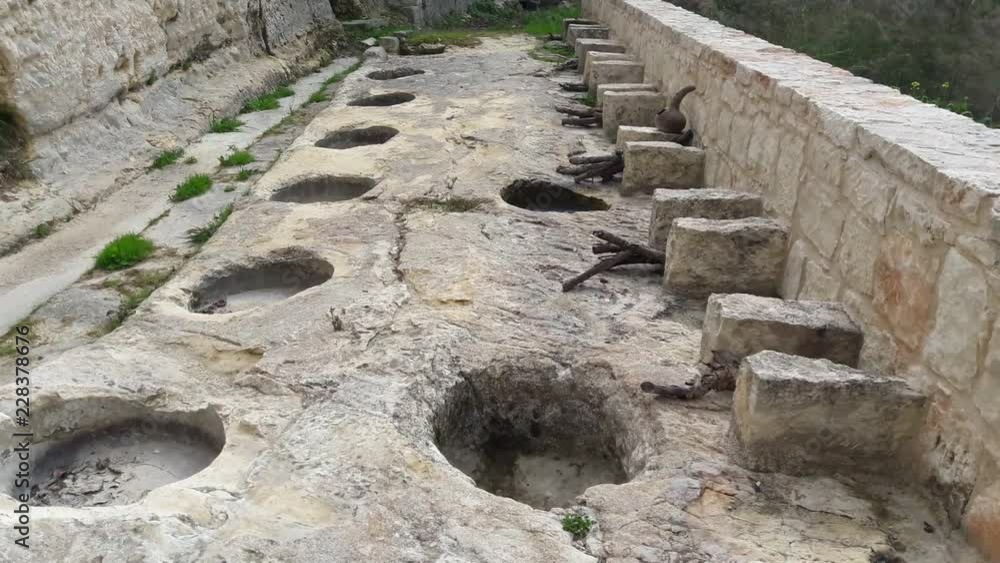 Ancient Greek ruins of old washing holes for laundry in Cyprus Stock ...