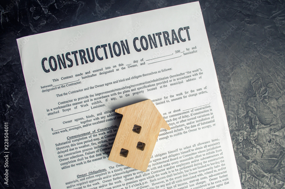 construction contract and house. concept of real estate and planning of ...