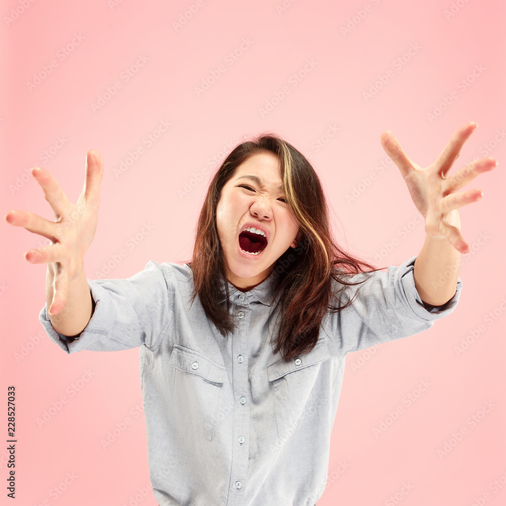 Screaming, hate, rage. Crying emotional angry woman screaming on pink ...