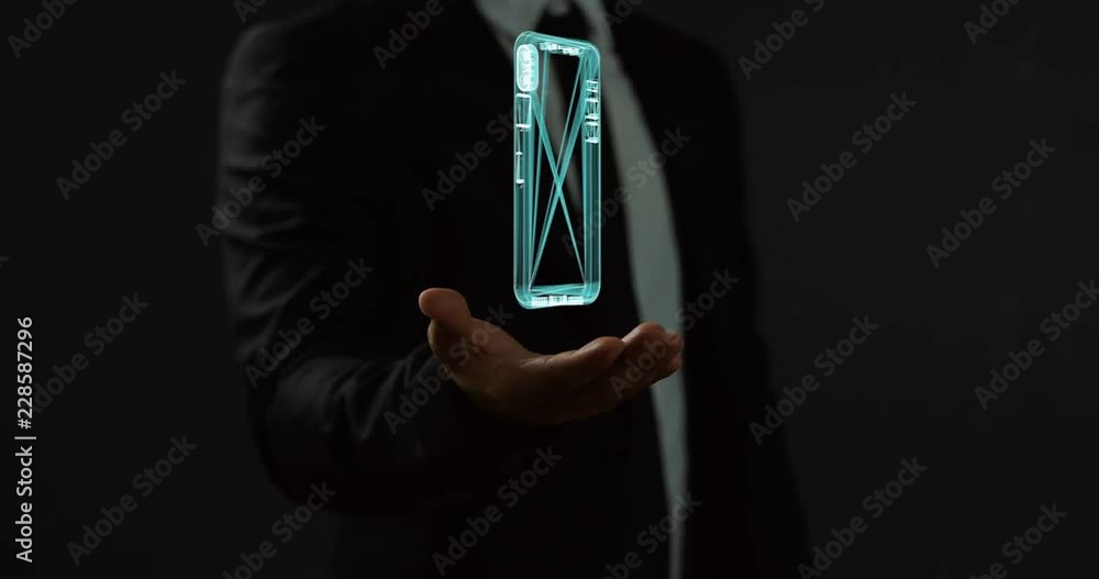 Hologram of 3D smartphone design spinning on the male hand while he ...