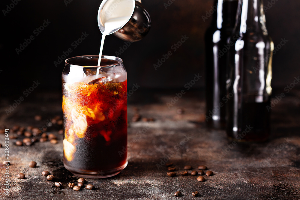 Cold brew iced coffee in glass bottles Stock Photo | Adobe Stock