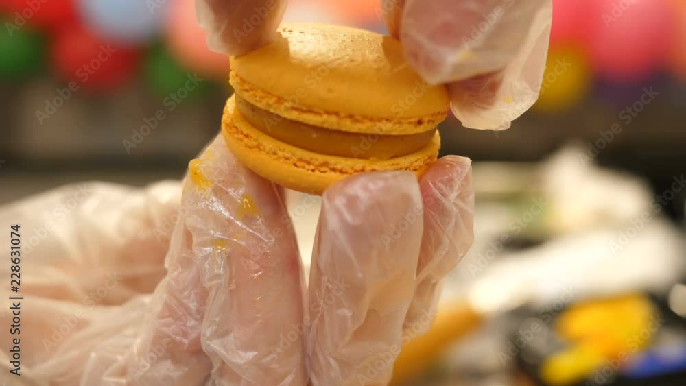 confectioner making french macaron cake in hands 4k. Stock Video ...