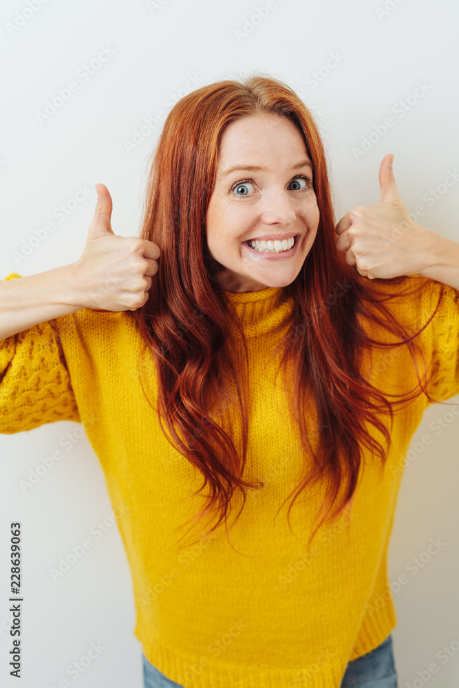 Excited Young Woman Giving A Double Thumbs Up Stock Foto Adobe Stock 0741