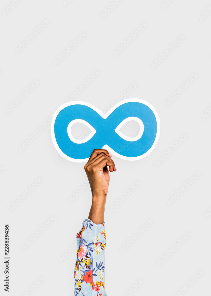 Hand holding an infinity sign Stock Photo | Adobe Stock