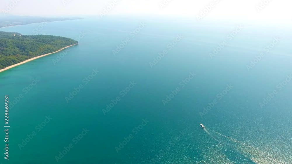 Drone Bird Eye View sideways motorboat tropical. Aerial view: fast ...