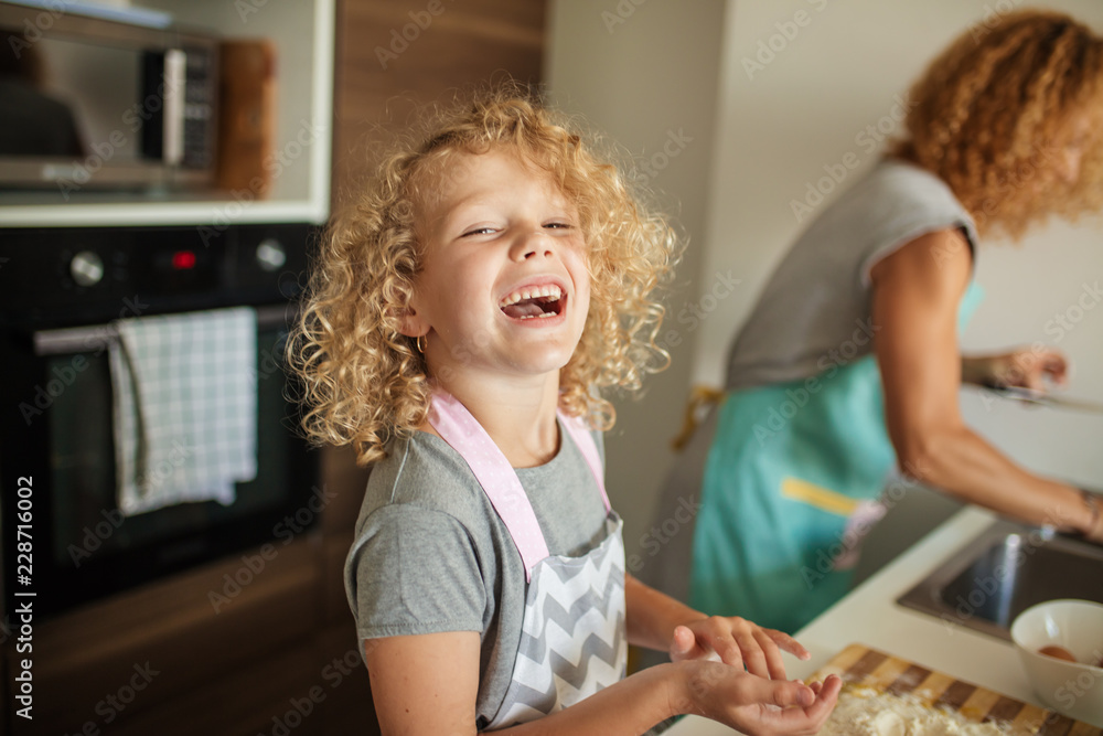 Happy daughter and her loving mother making dinner for Mother s Day ...