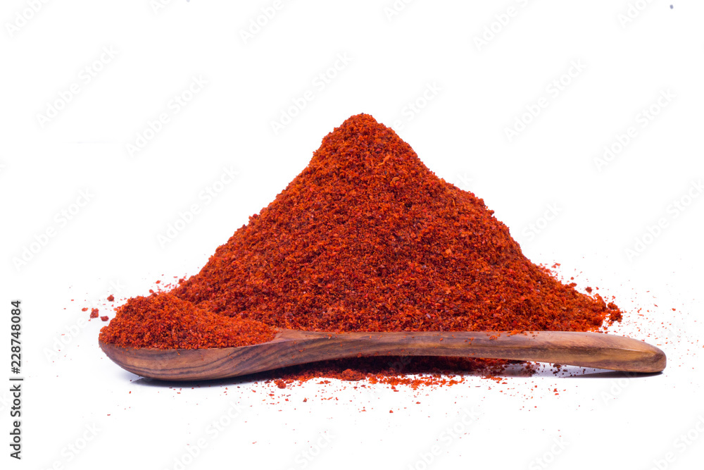red chili powder isolated on white background Stock Photo | Adobe Stock
