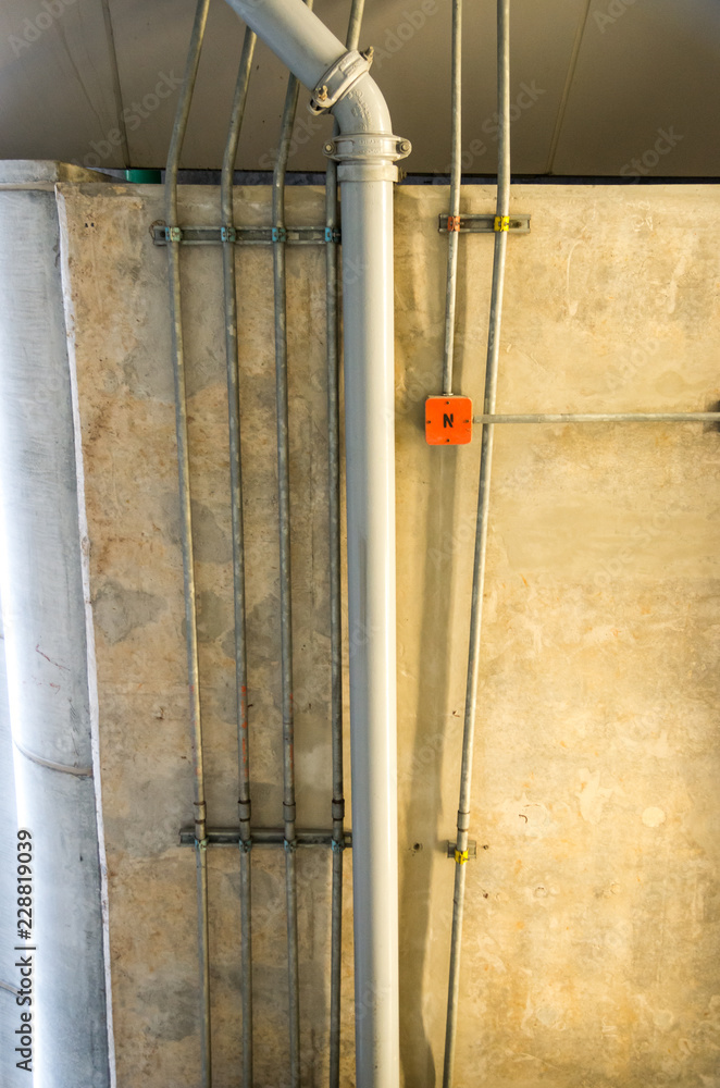 power line in running conduit tube on ceiling, galvanized steel conduit ...