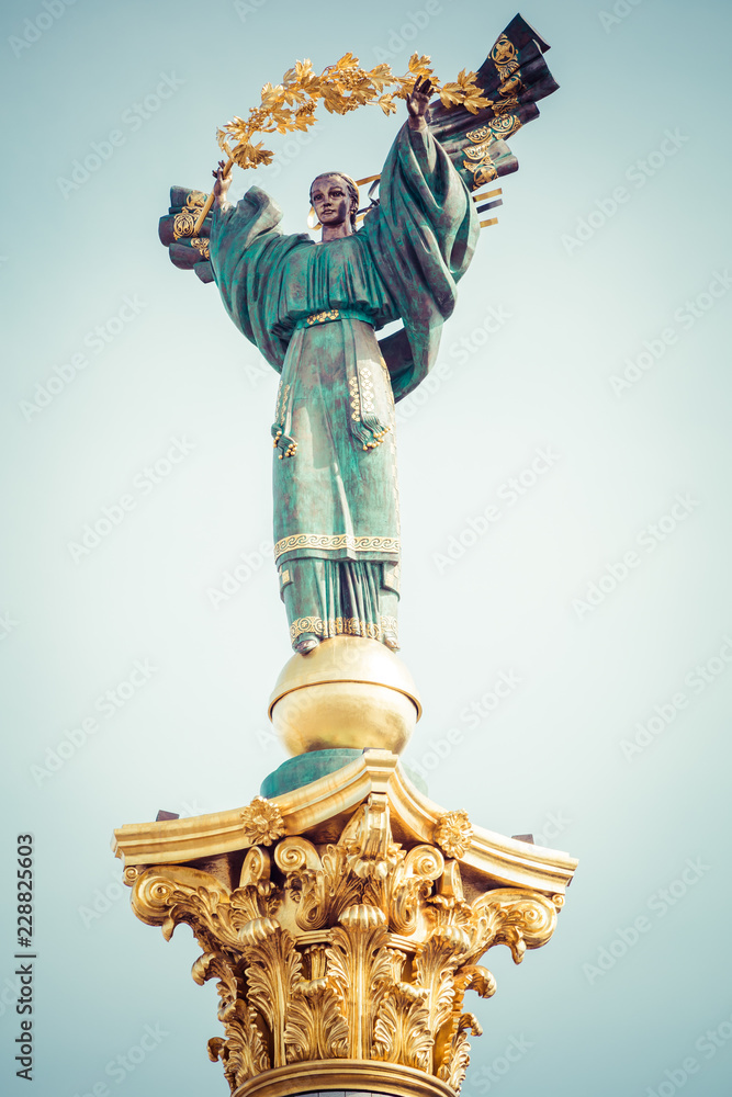Statue of Independence and Liberty on marble pedestal in center of Kiev ...