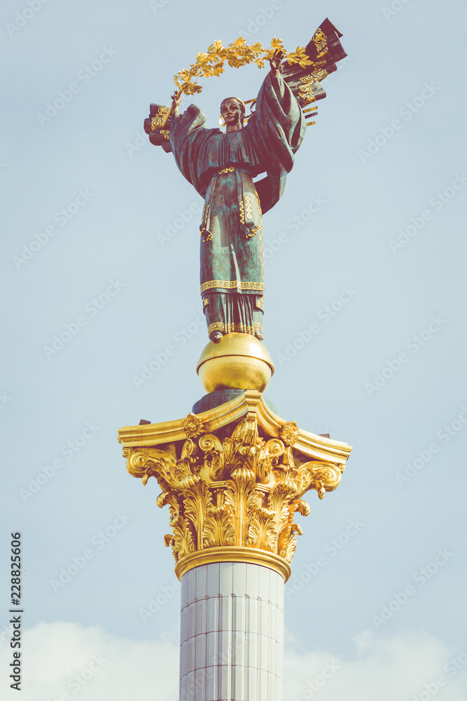 Statue of Independence and Liberty on marble pedestal in center of Kiev ...