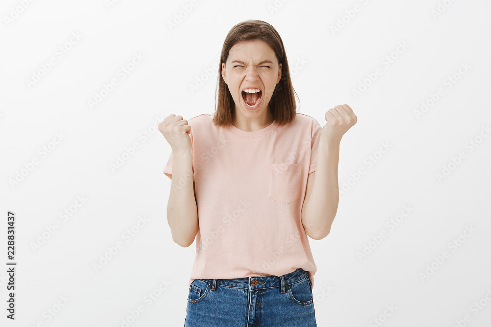Attractive and emtoive woman cheering for favorite team, screaming and ...
