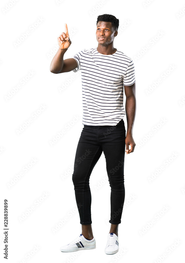 Full body of Dark skinned man with striped shirt touching on ...