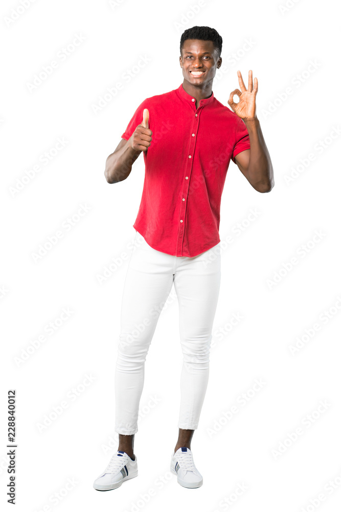 Full Body Of Young African American Man Showing An Ok Sign With Fingers