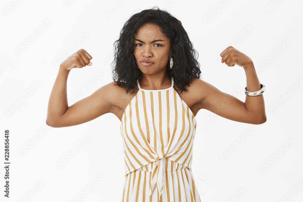 Who say girl weak. Portrait of serious-looking strong and powerful ...