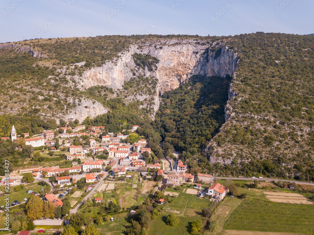 The Osp (Ospo) is a village close to Trieste just below a huge rock ...