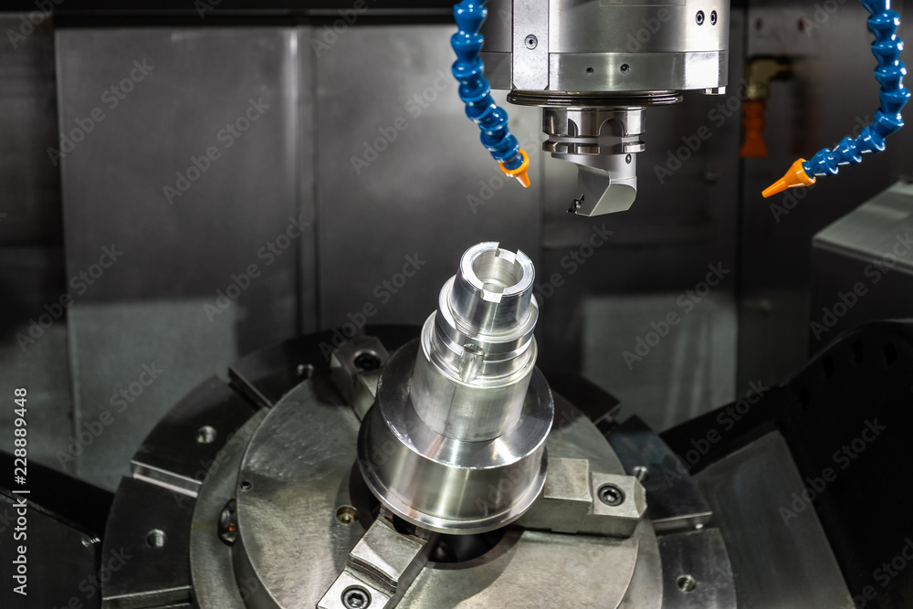 CNC machine spindle and five axis table Stock Photo | Adobe Stock