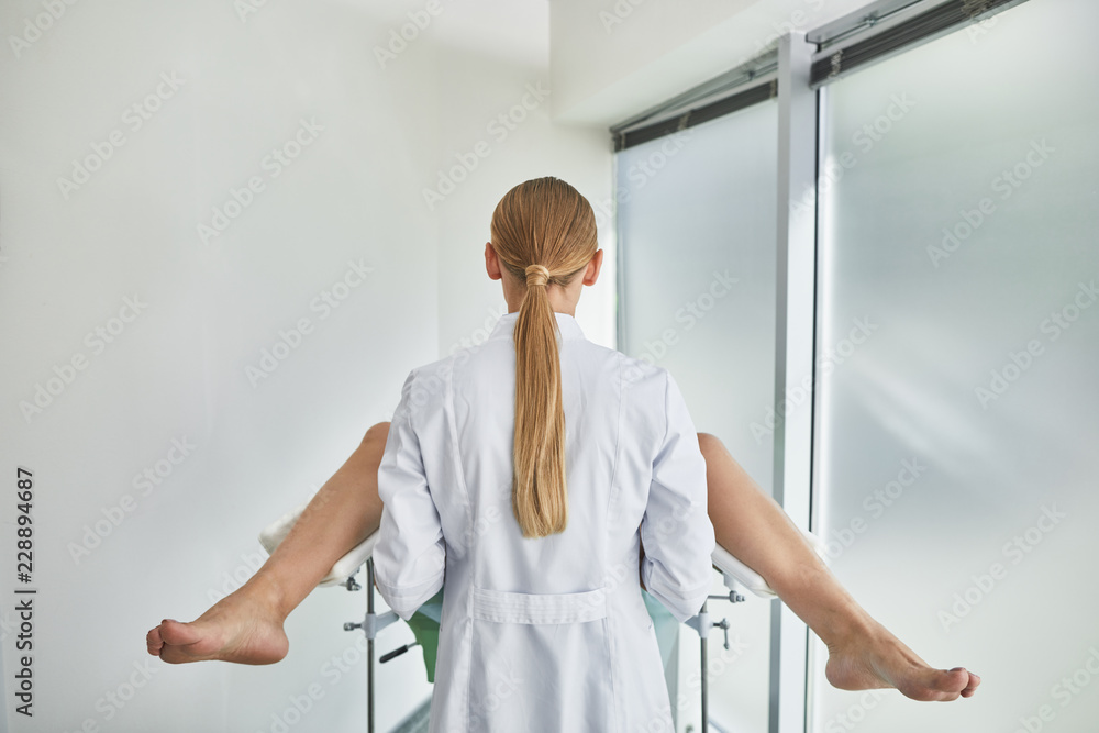 Relax And Do Not Worry Back View Portrait Of Female Gynecologist